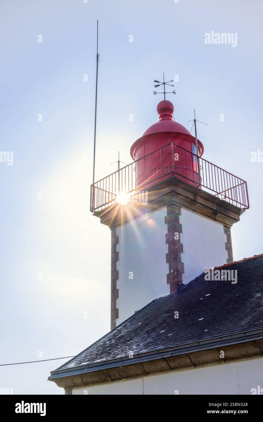 Sun rays at an old lighthouse Stock Photo - Alamy