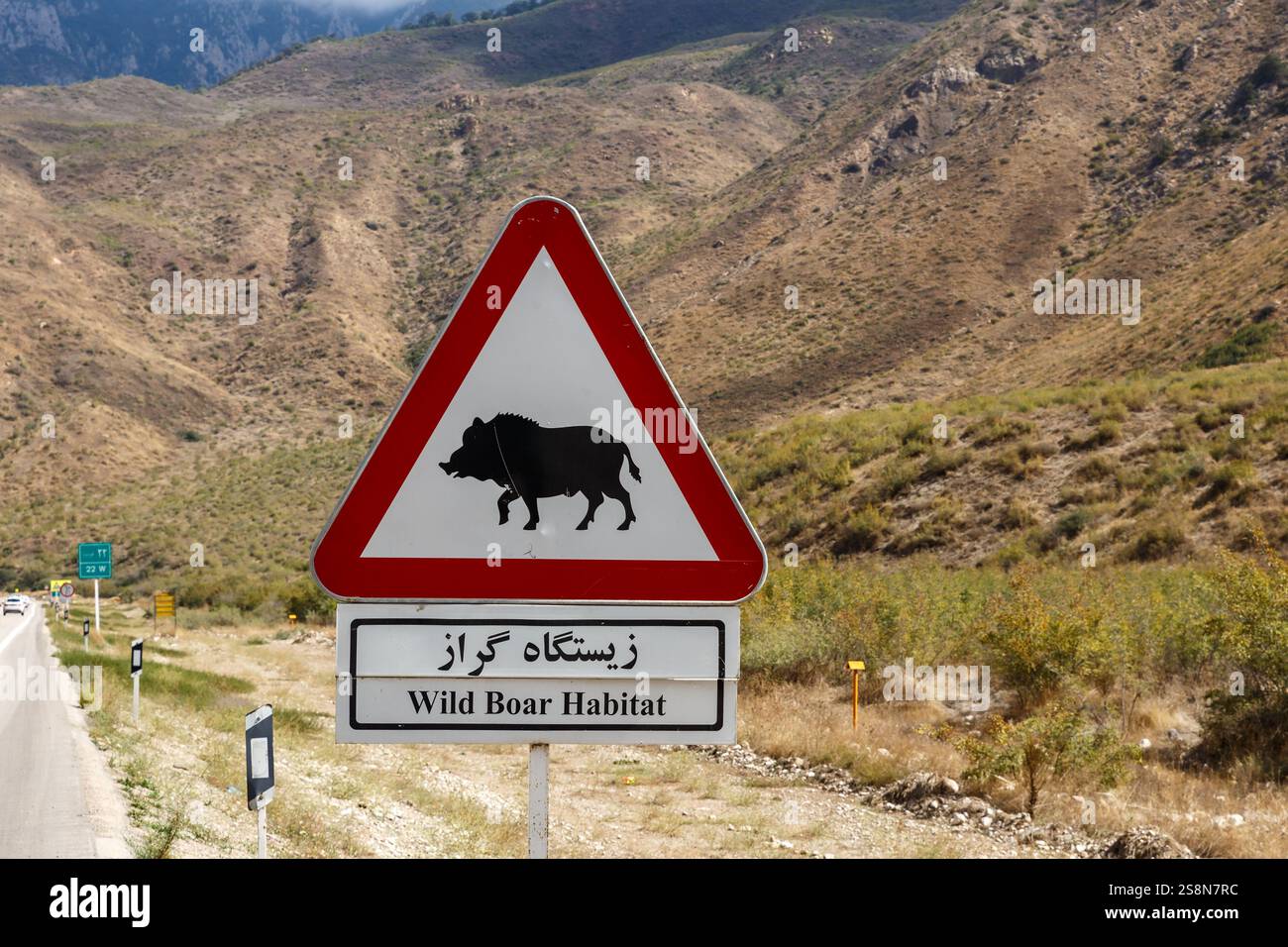 A warning sign indicates the presence of wild boars along the Gorgan ...