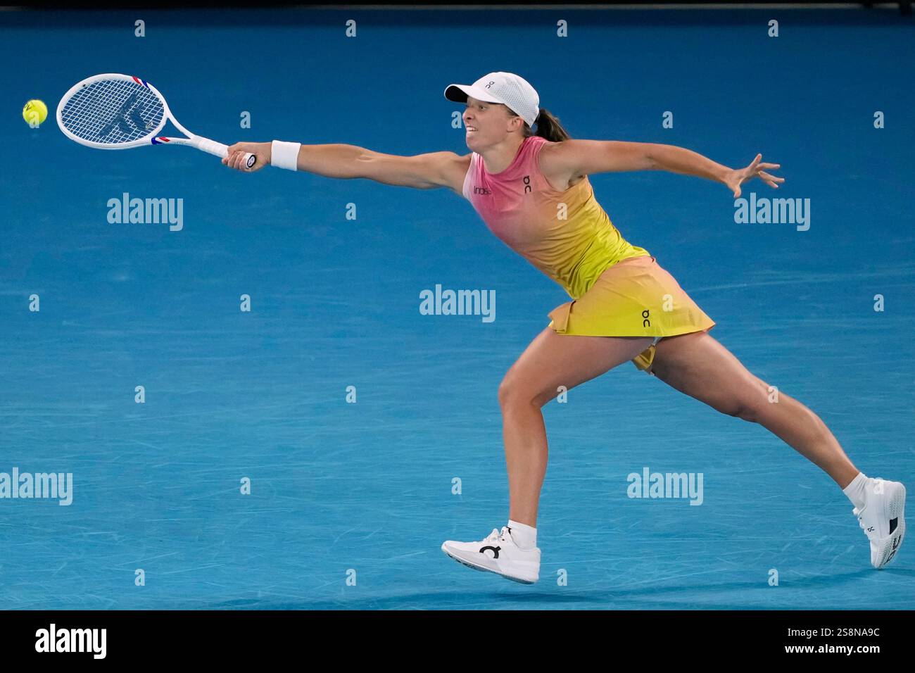 Iga Swiatek of Poland plays a forehand return to Madison Keys of the U ...