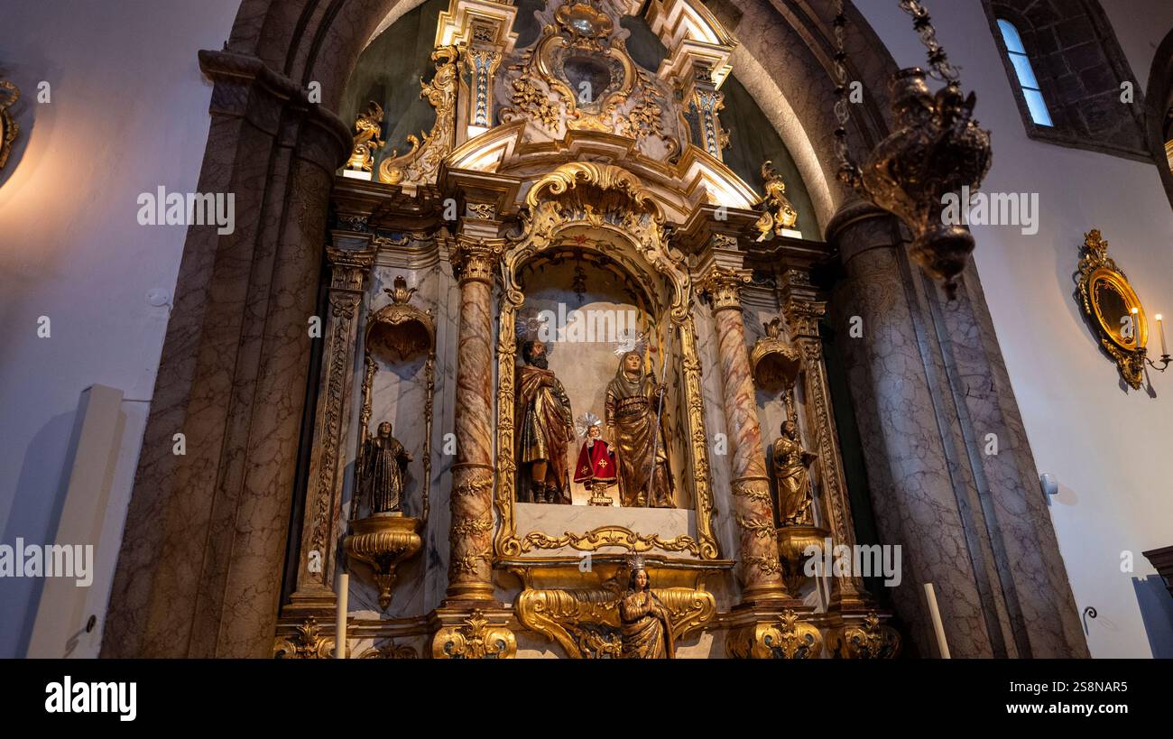 An ornate baroque altar inside a historic church, featuring intricate ...