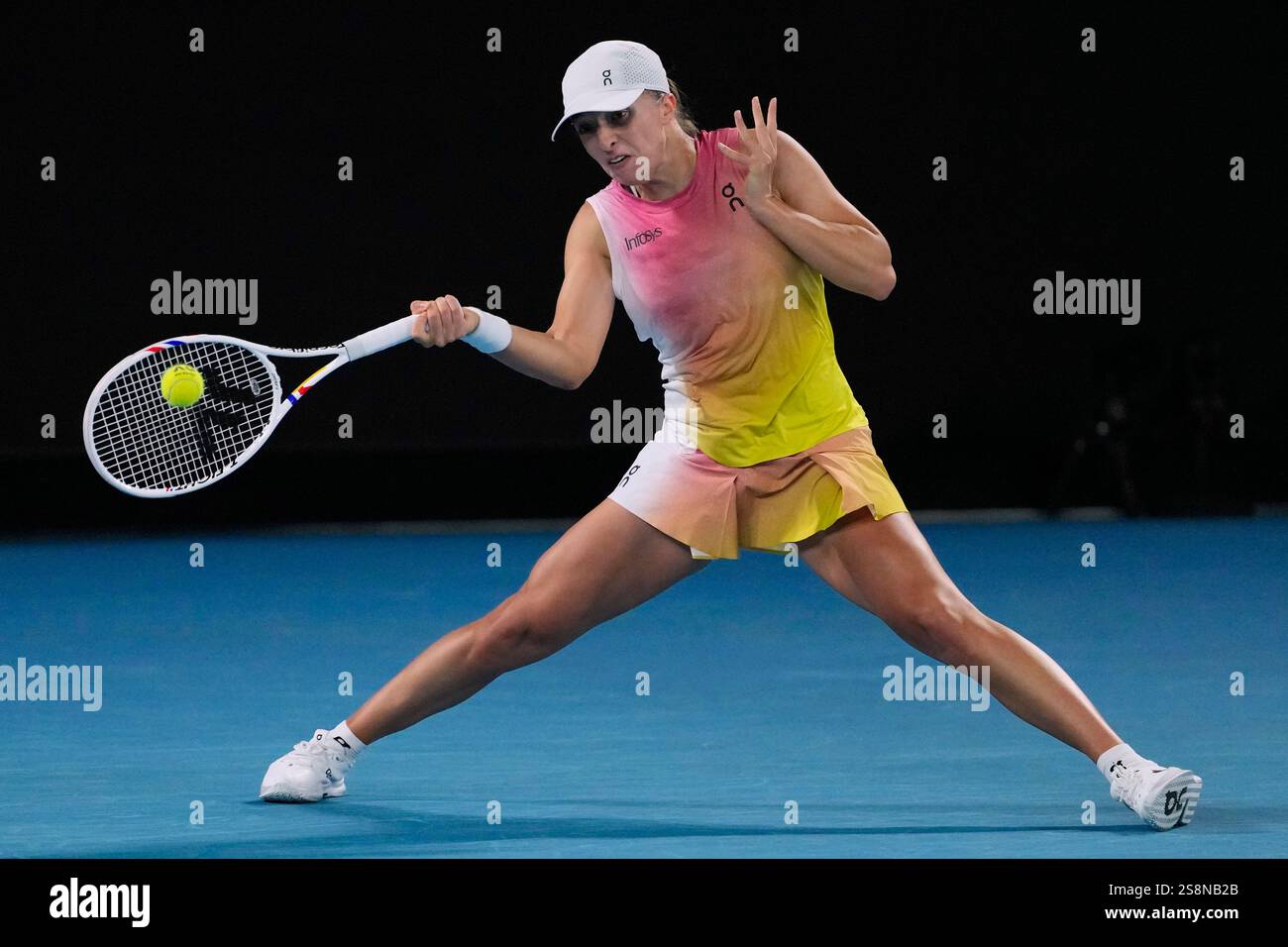 Iga Swiatek of Poland plays a forehand return to Madison Keys of the U ...