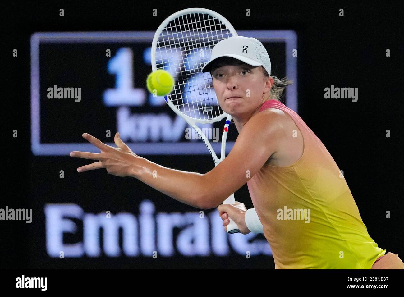 Iga Swiatek of Poland plays a forehand return to Madison Keys of the U ...