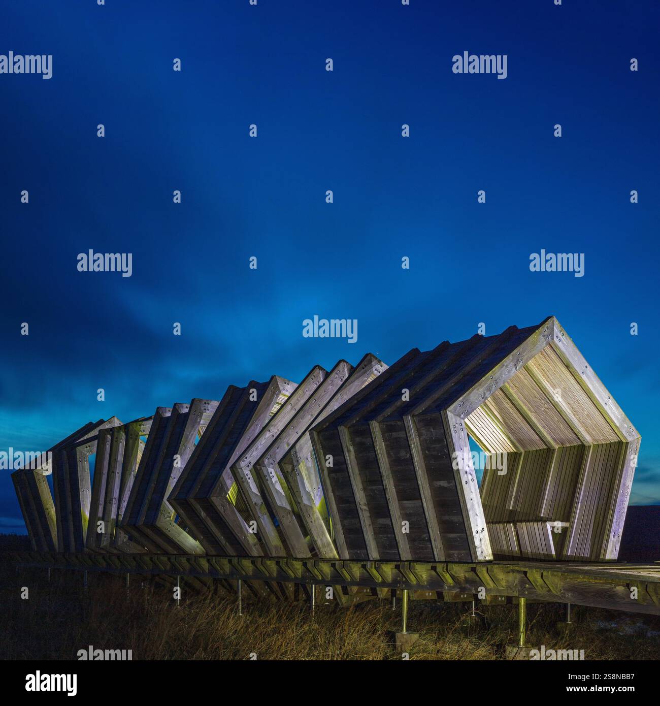 A view at dusk of the wooden sculpture Blakehope Nick Overlook in ...