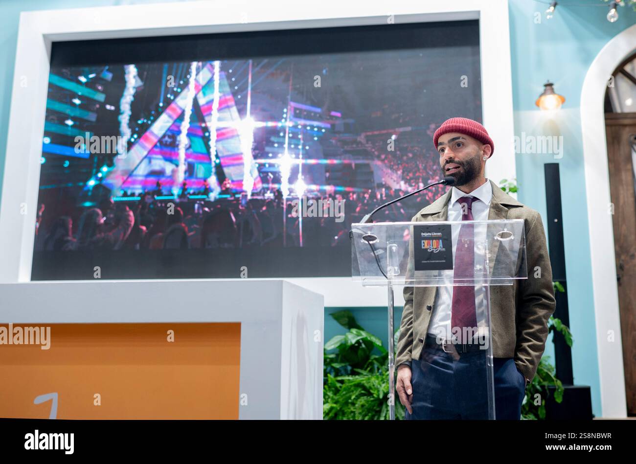The singer and composer Arcángel, speaks during a presentation at the ...