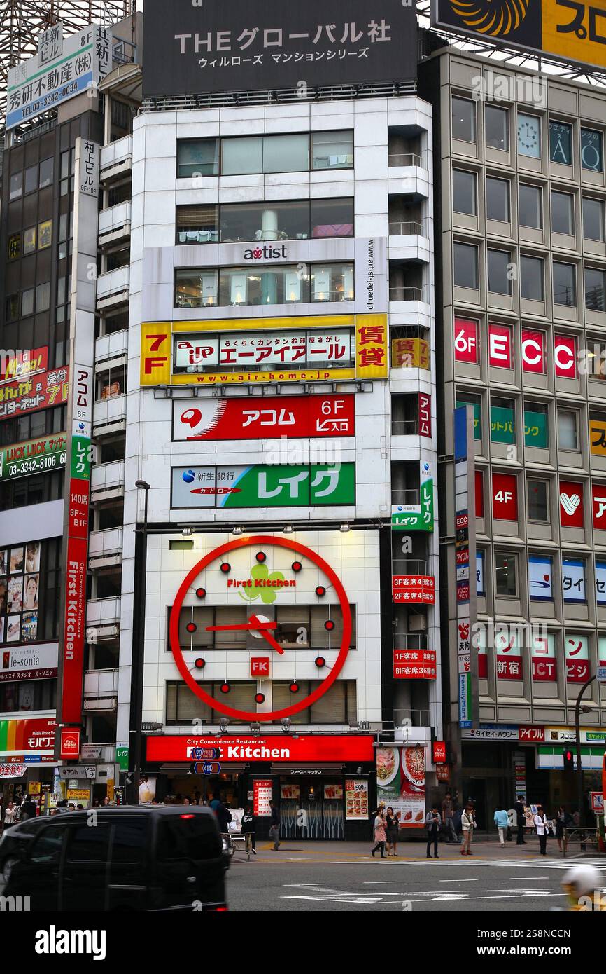 TOKYO, JAPAN - MAY 8, 2012: People visit Shinjuku, Tokyo, Japan. The ...