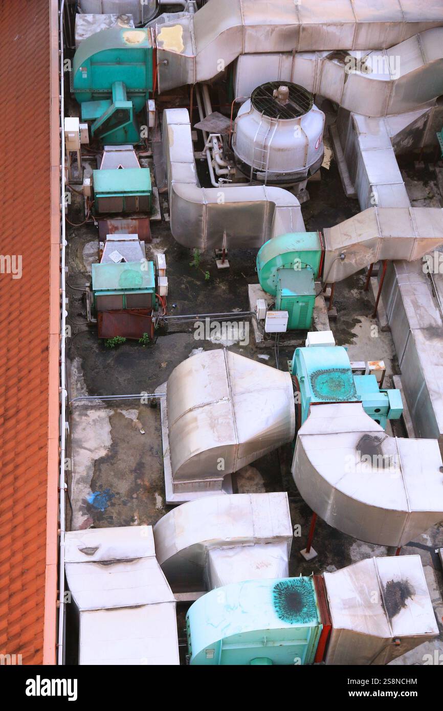 Air conditioning ducts on roof. HVAC systems atop office building. HVAC ...