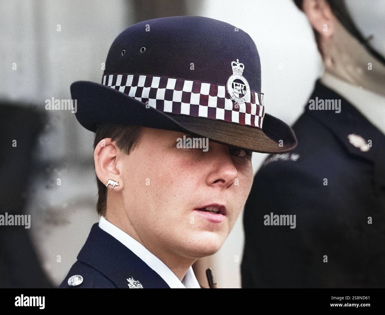 Female british police officer wearing hi-res stock photography and ...
