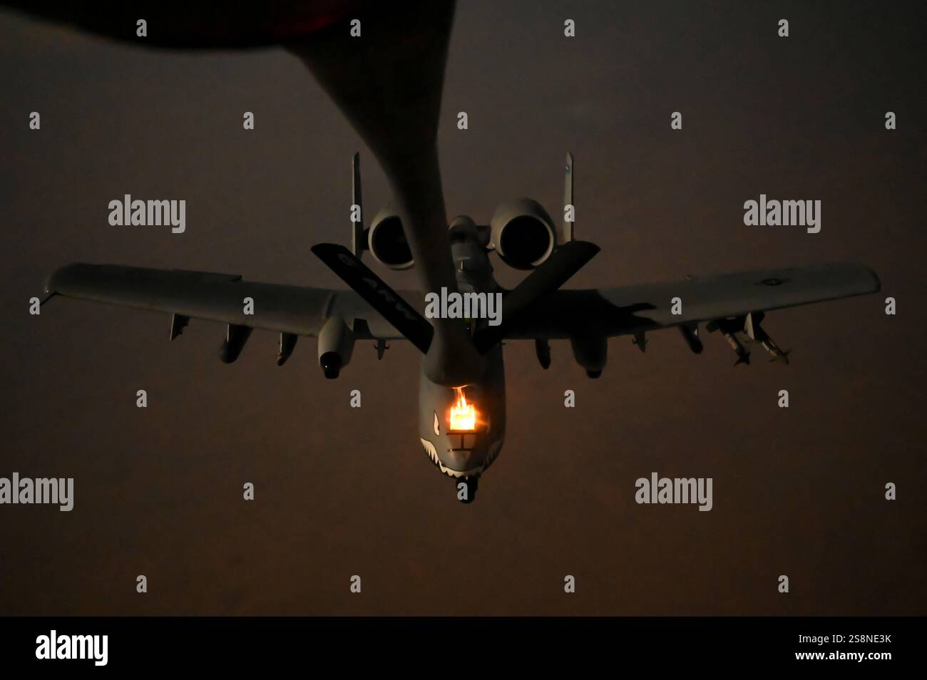 A U.S. Air Force A-10 Thunderbolt II approaches a KC-135 Stratotanker for aerial refueling over ...