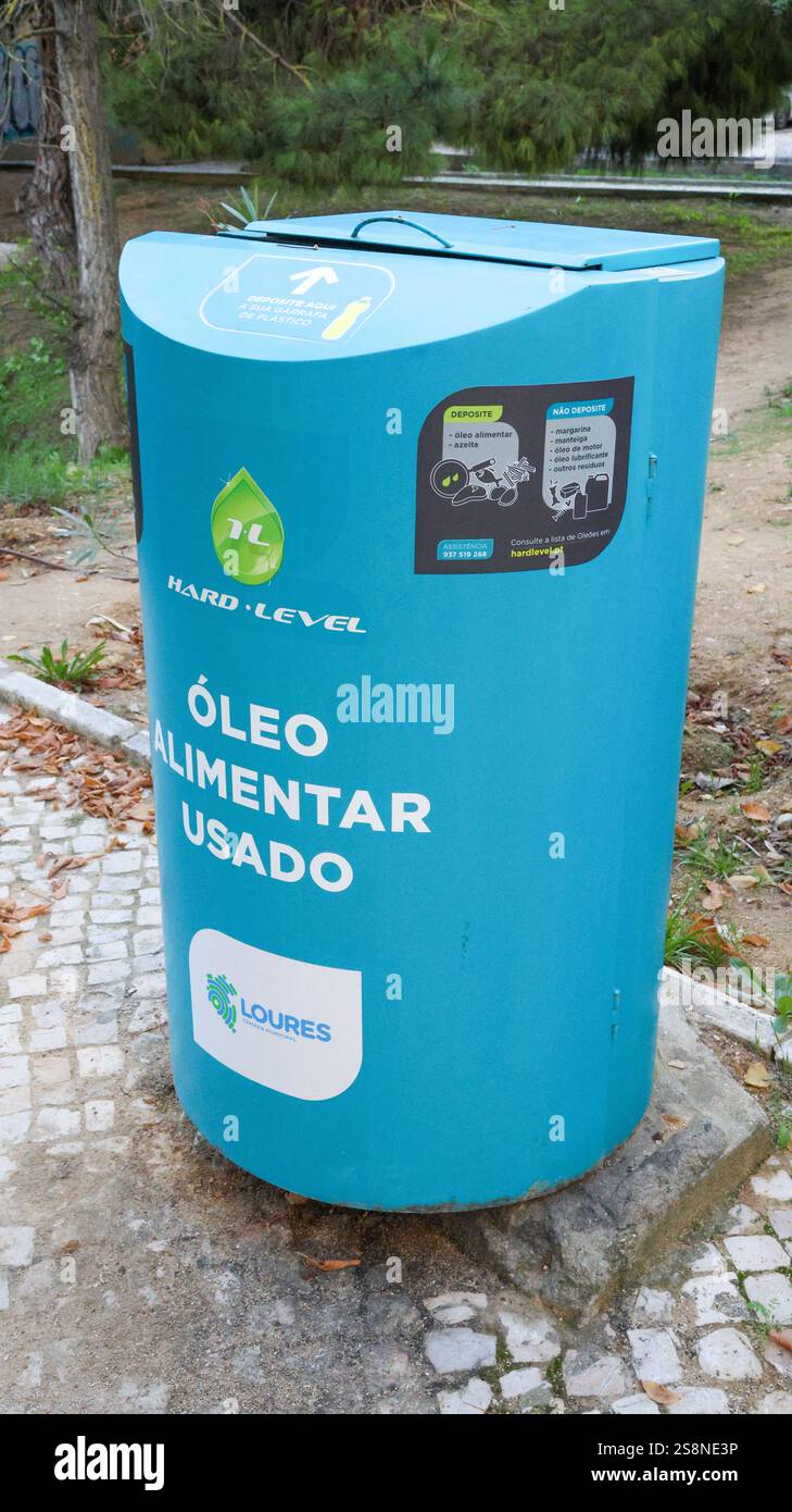 Blue recycling bin designated for used cooking oil, fostering ...