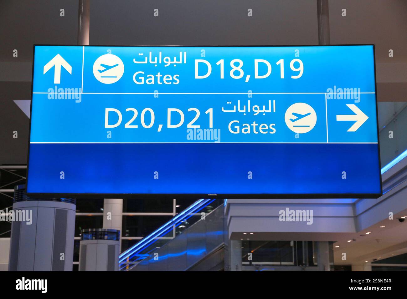DUBAI, UAE - NOVEMBER 23, 2017: Gate signs at Dubai International ...