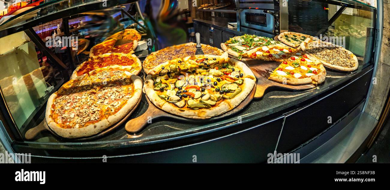 Different kinds of Pizza displayed in a Street Showcase Stock Photo - Alamy