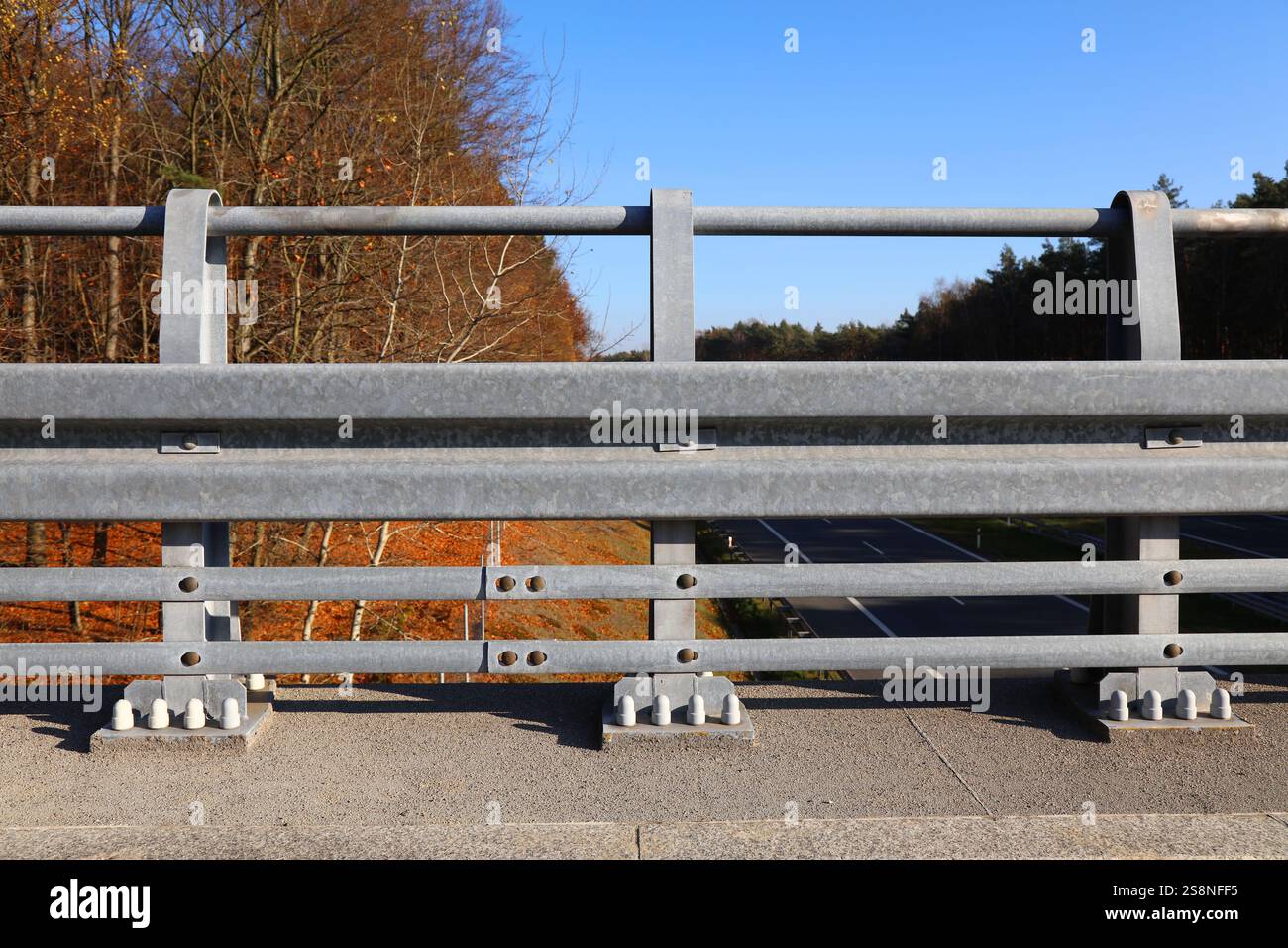 Guardrail traffic barrier on the side of a highway bridge in ...
