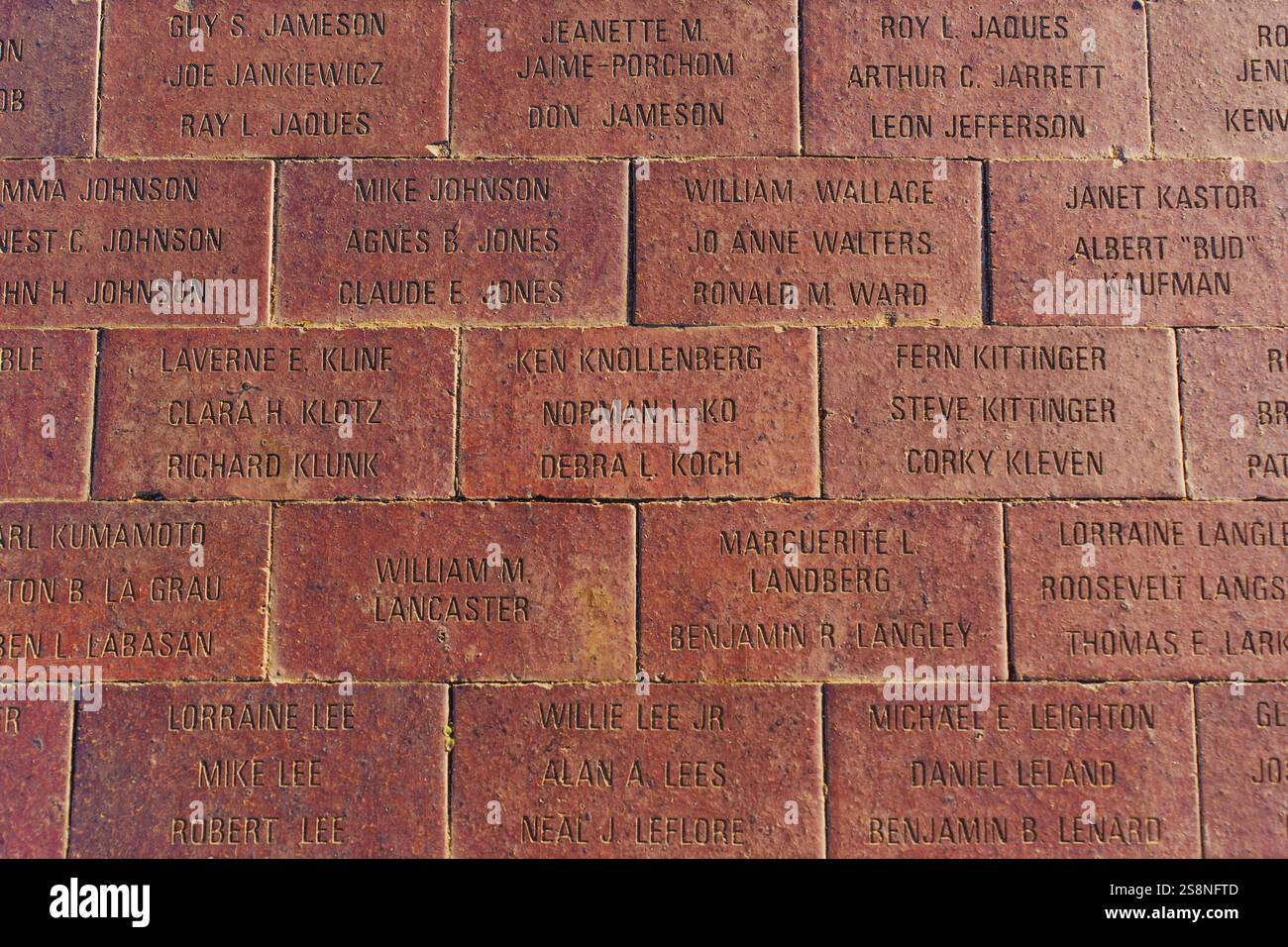 Long Beach, California - January 15, 2025: Close-up of engraved bricks ...