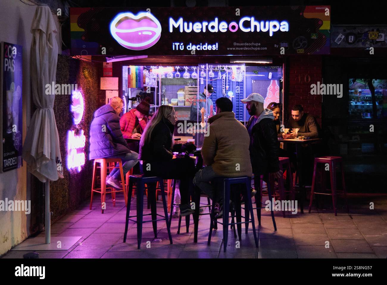 Madrid. Spain - January 23, 2025: Outdoor dining scene in Madrid with ...