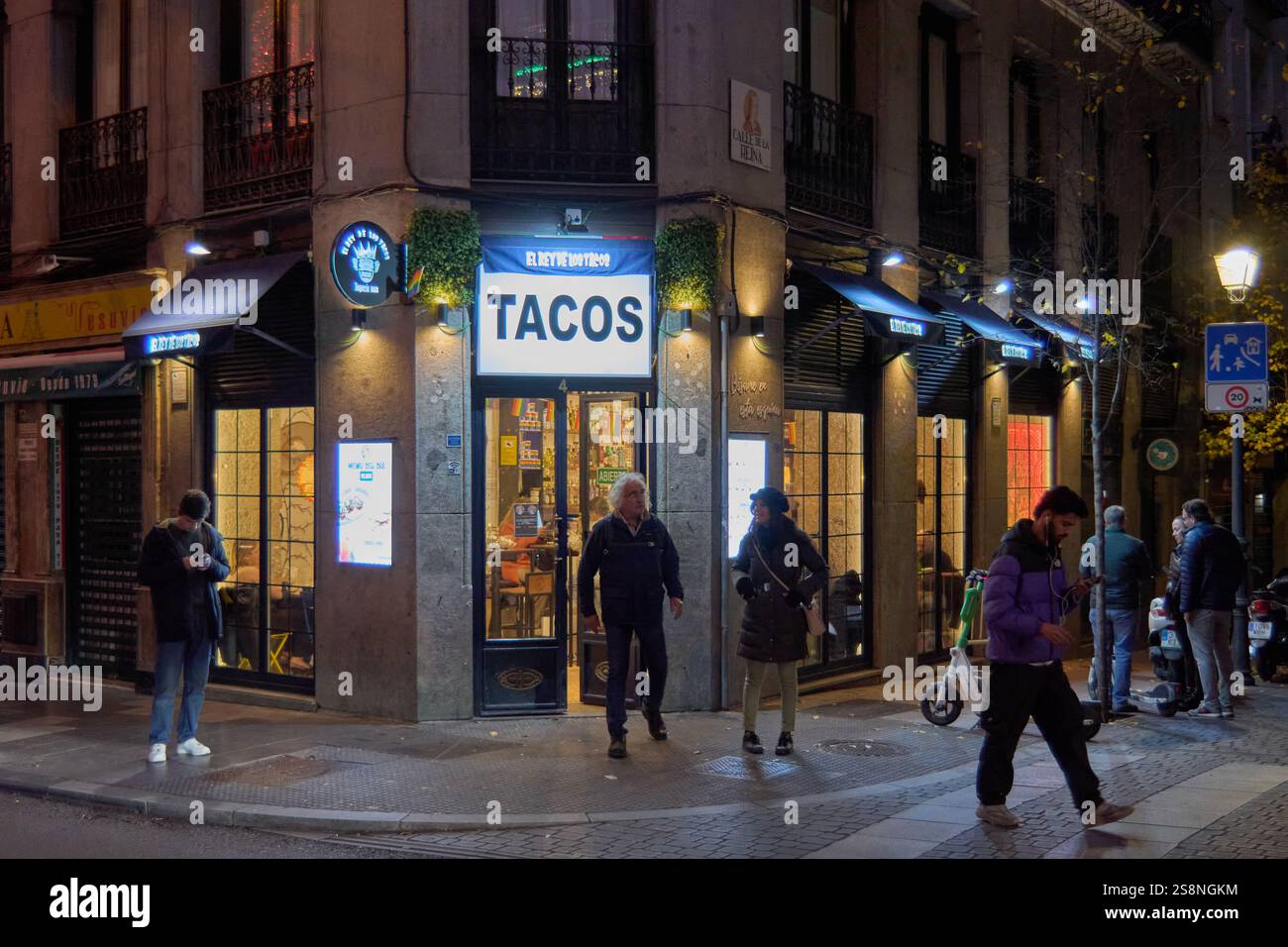 Madrid, Spain - January 23, 2025: Busy corner of Madrid with a lively ...