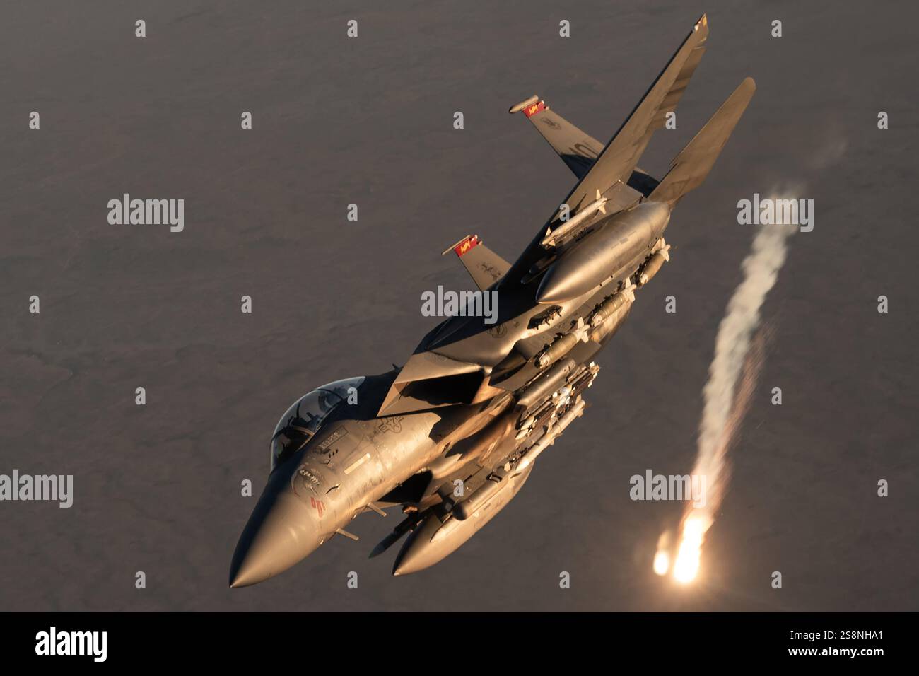 A U.S. Air Force F-15E Strike Eagle conducts combat air patrols over the U.S. Central Command ...