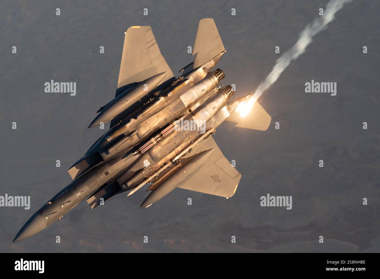 A U.S. Air Force F-15E Strike Eagle conducts combat air patrols over the U.S. Central Command ...