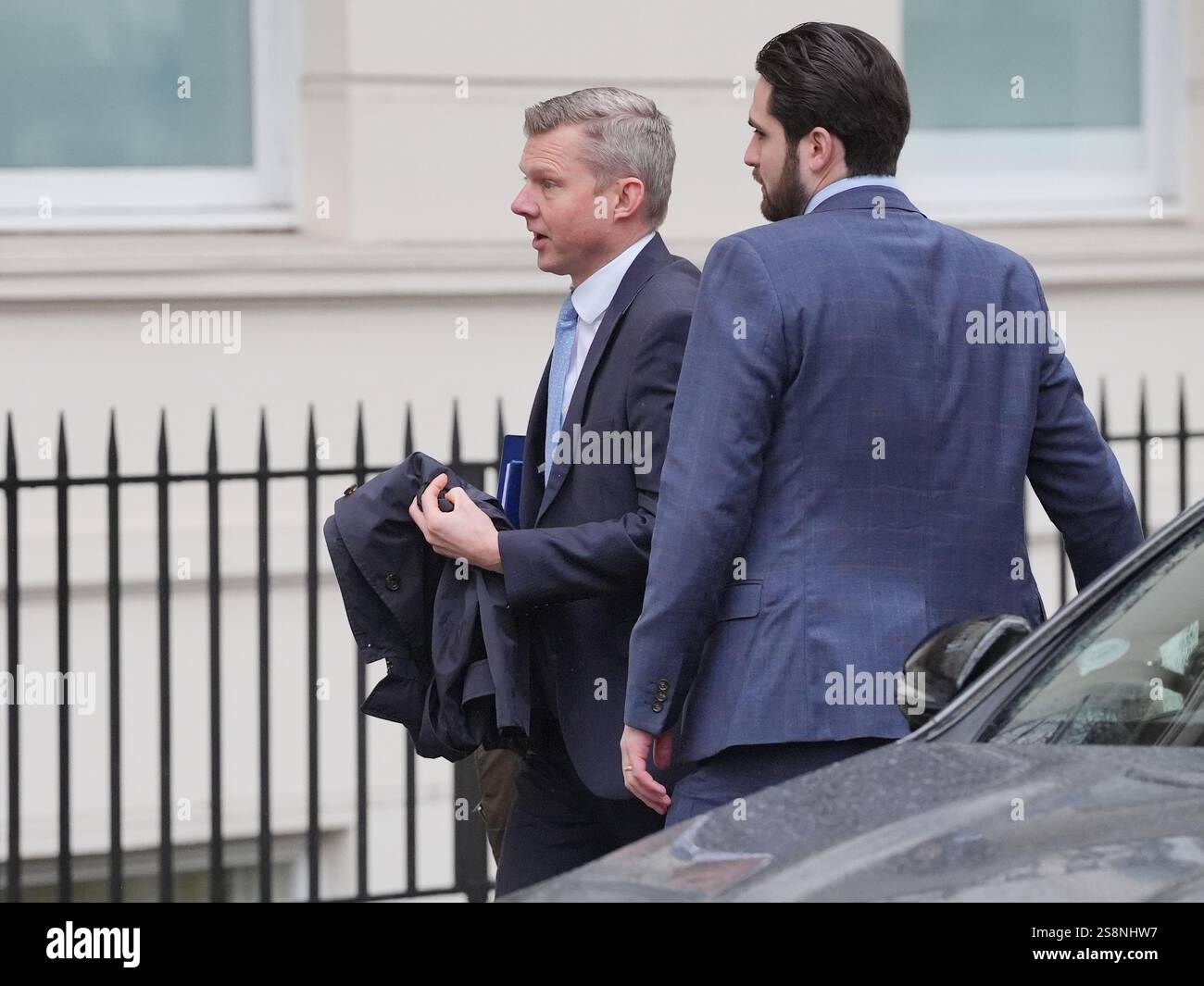 Ben Osborn (left), UK Country Manager of Pfizer, arrives to give ...