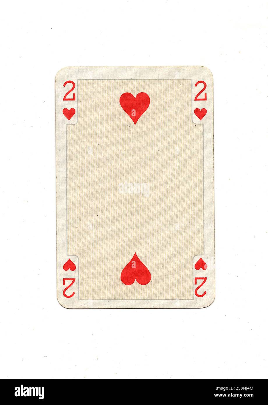 An antique two of hearts playing card isolated on a white background ...