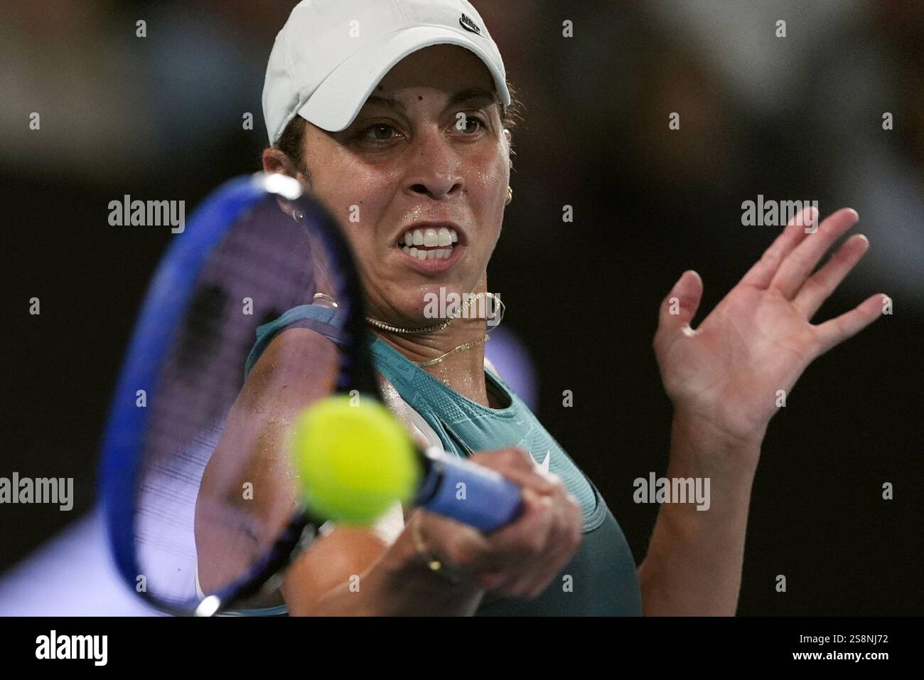 Madison Keys of the U.S. plays a forehand return to Iga Swiatek of ...