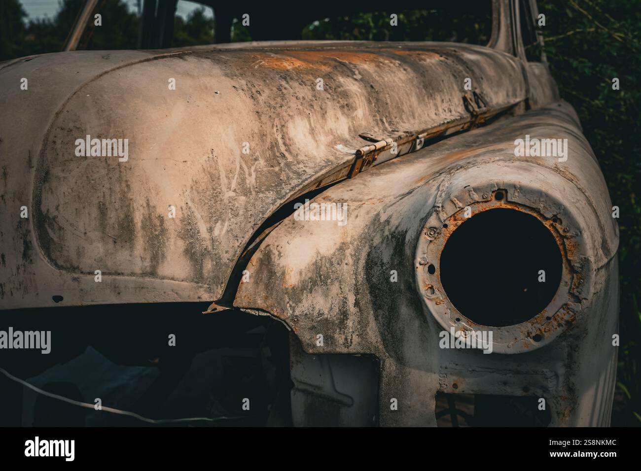Hole for the headlight on the front vintage car. Carcass part of an old ...