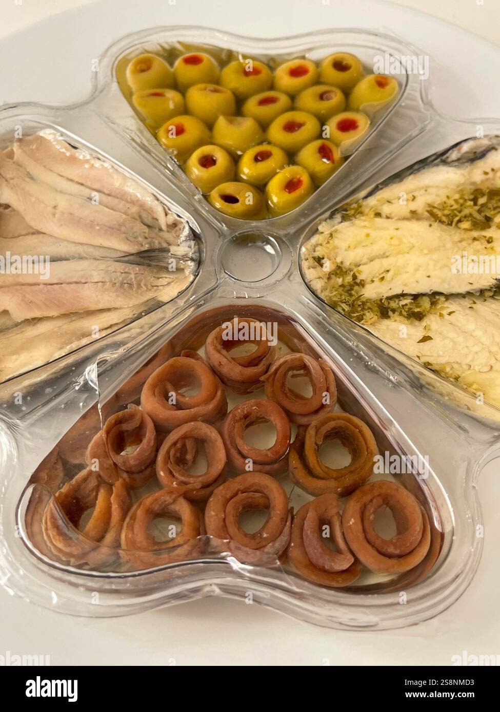 Anchovy fillets, Boquerones, Sardines and olives. Spain Stock Photo - Alamy