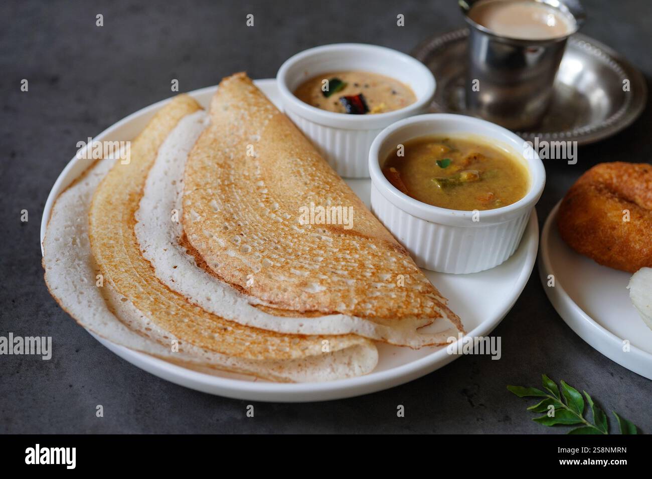 Homemade Triangle Dosa served with chutney sambar idli and vada | South ...