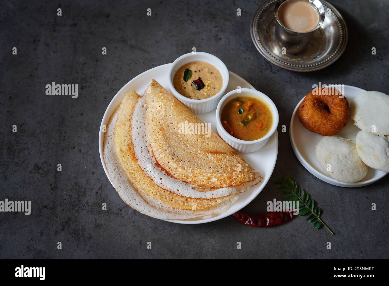 Homemade Triangle Dosa served with chutney sambar idli and vada | South ...