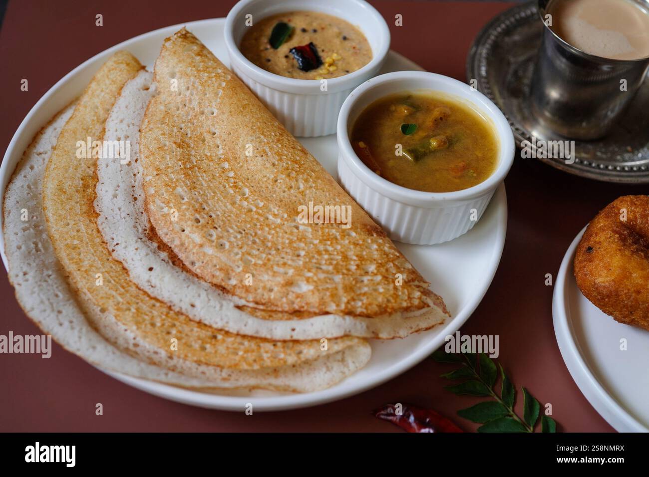 Homemade Triangle Dosa served with chutney sambar idli and vada | South ...