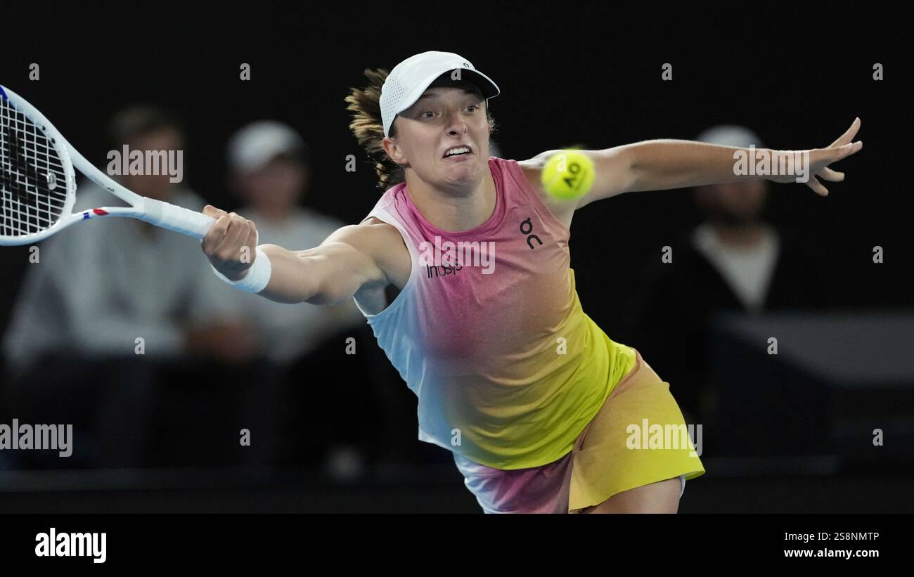 Iga Swiatek of Poland plays a forehand return to Madison Keys of the U ...