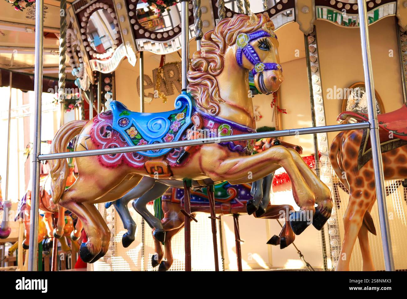 Colorful Carousel Horses background in Spain Stock Photo - Alamy