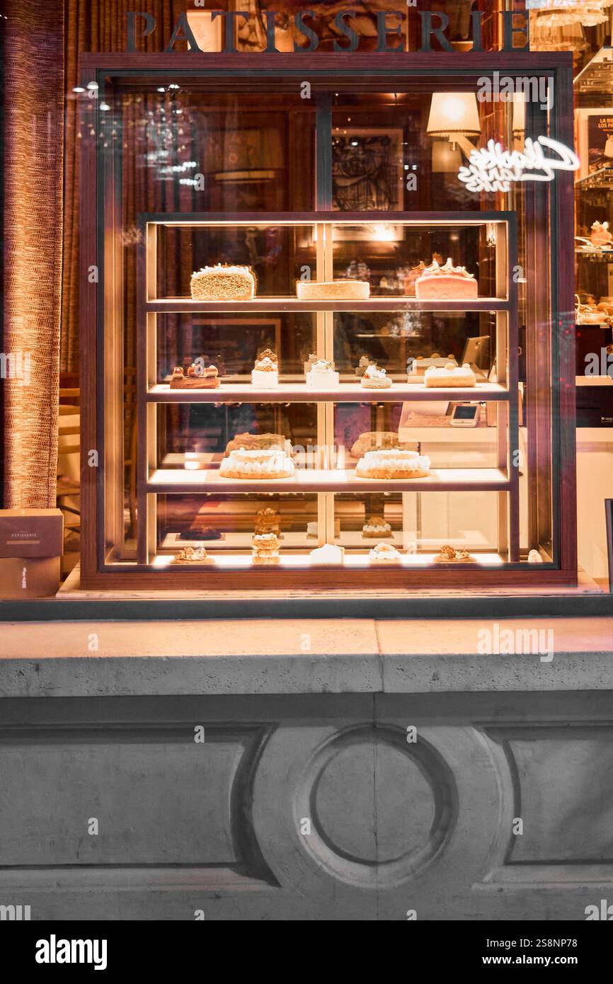 A well-lit bakery display case showcasing a variety of mouth-watering ...