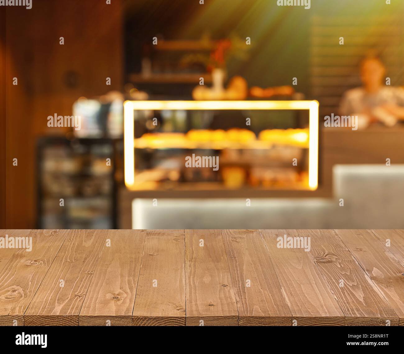 Empty wooden table in restaurant, space for design Stock Photo - Alamy