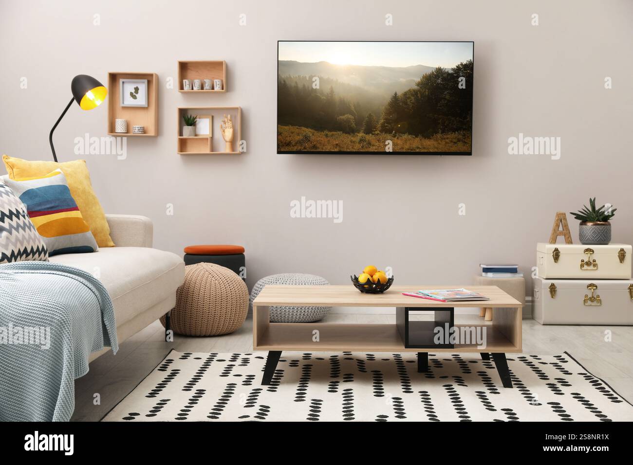 TV set with nature landscape on screen in room Stock Photo - Alamy
