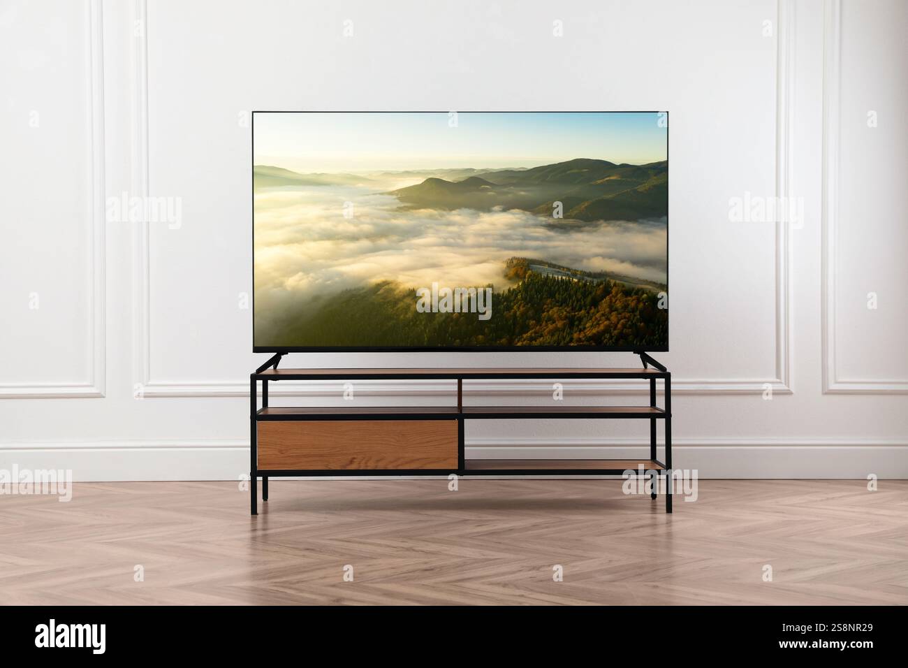TV set with nature landscape on screen in room Stock Photo - Alamy