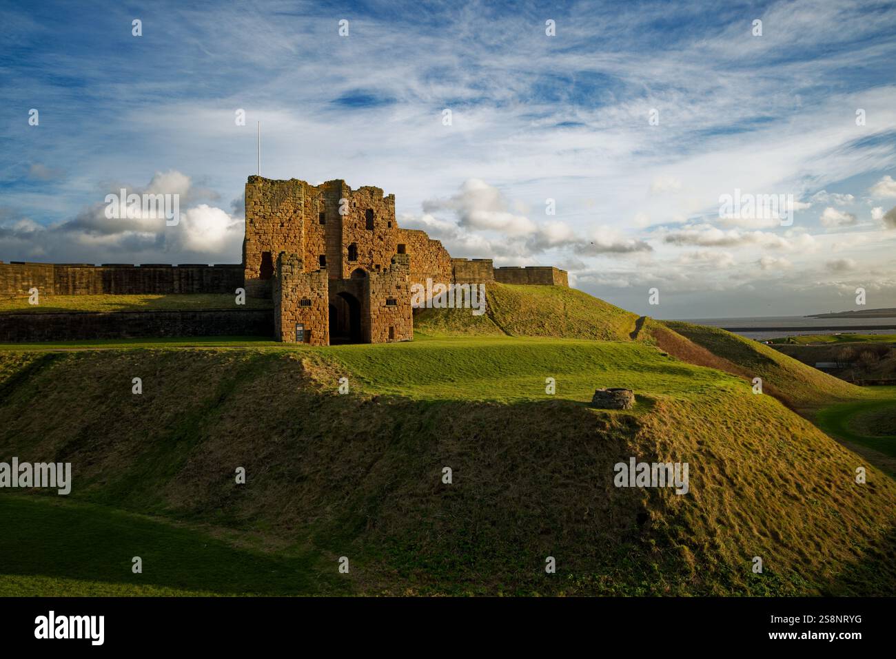The impressive ruins of Tynemouth Castle sit above the dray moat at ...