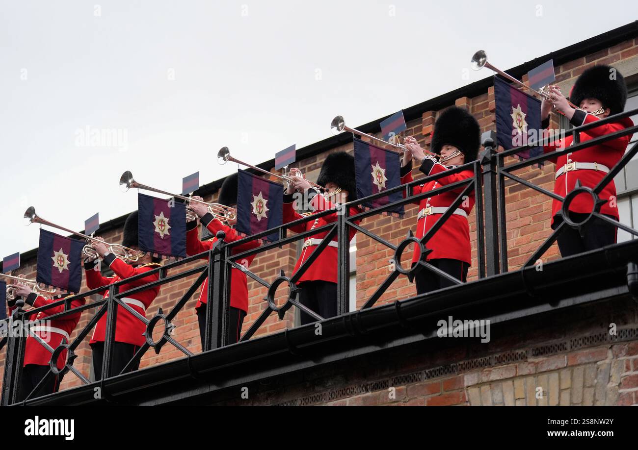 Members of the Band of the Coldstream Guards play a fanfare as the ...