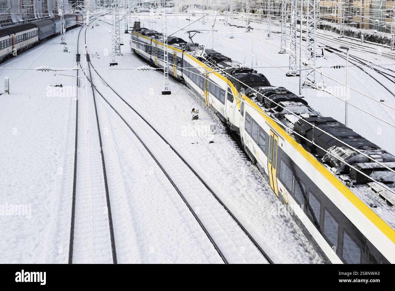 Tracks and train covered with snow and ice, Freiburg im Breisgau, Black ...