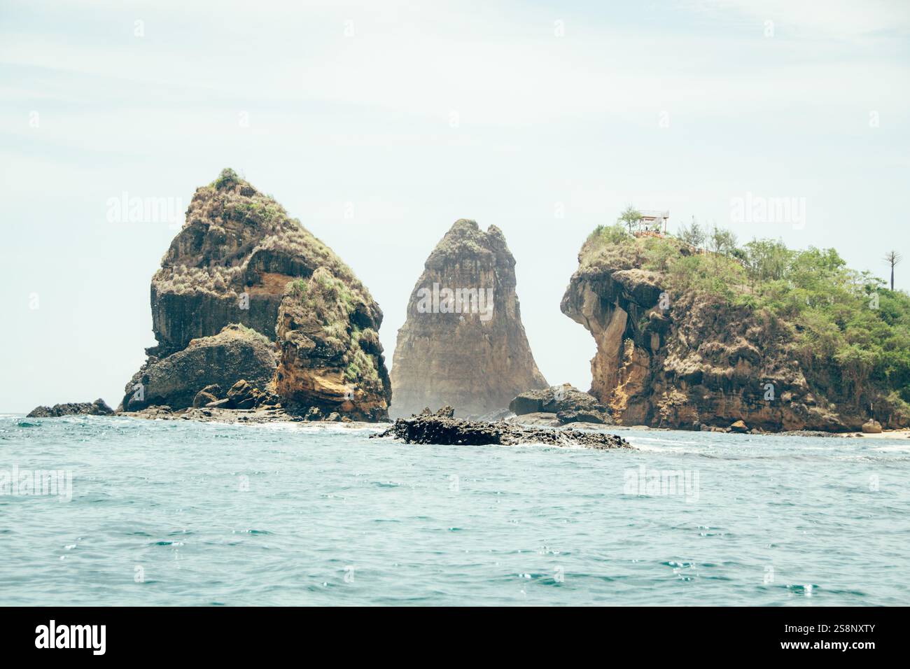 Beautiful rocks on Tanjung Papuma beach, Jember, Indonesia Stock Photo ...