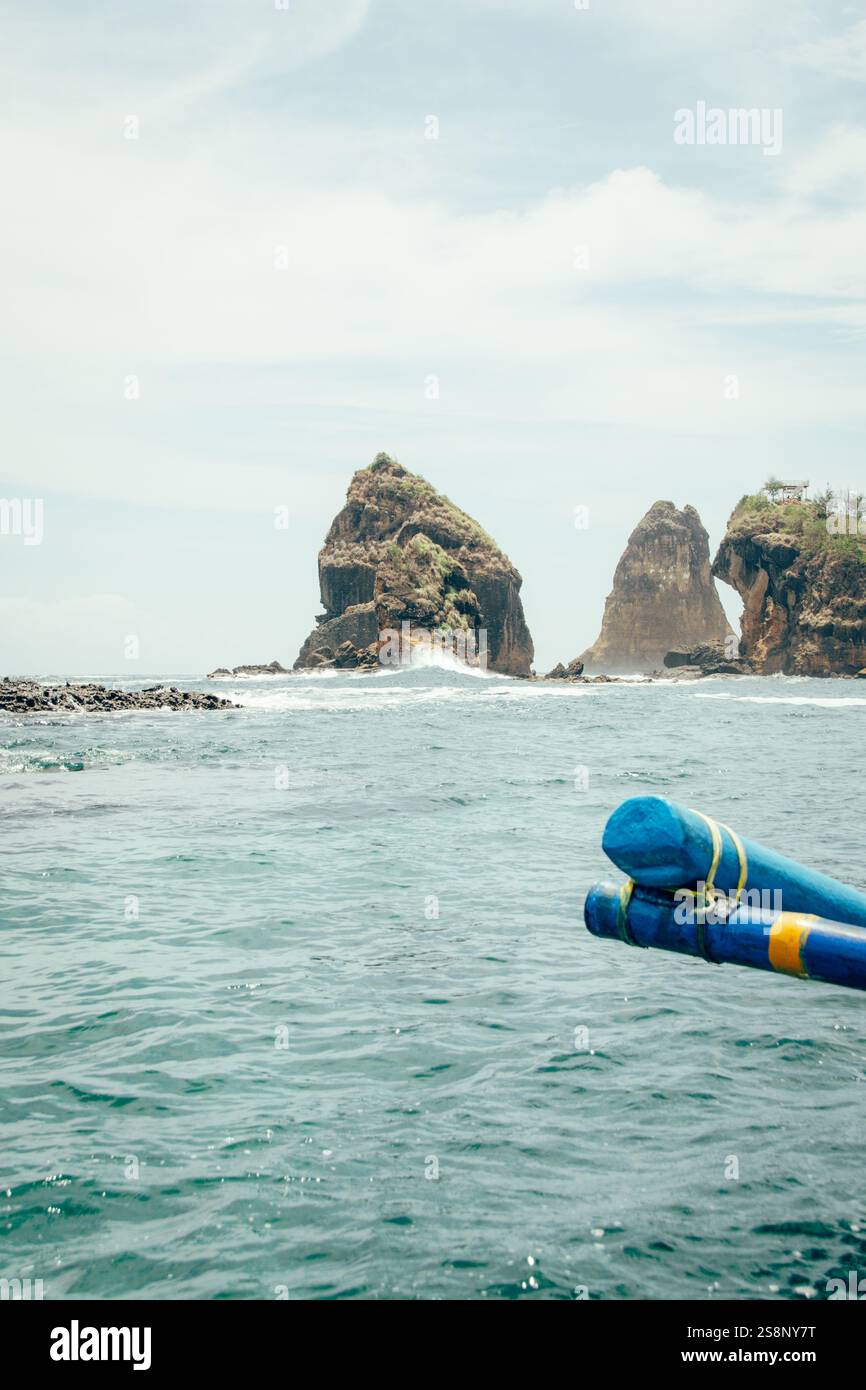 Beautiful rocks on Tanjung Papuma beach, Jember, Indonesia Stock Photo ...