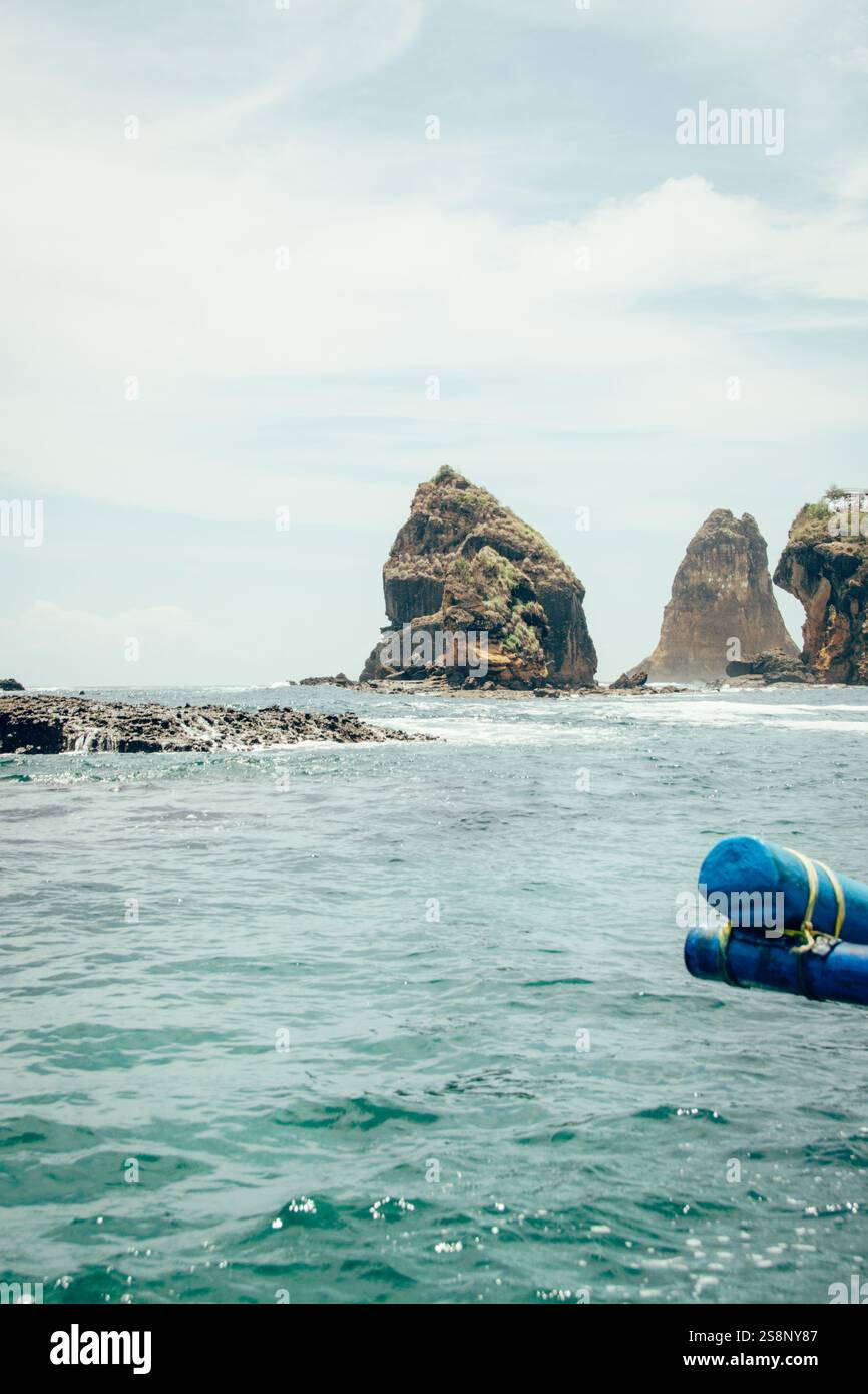 Beautiful rocks on Tanjung Papuma beach, Jember, Indonesia Stock Photo ...