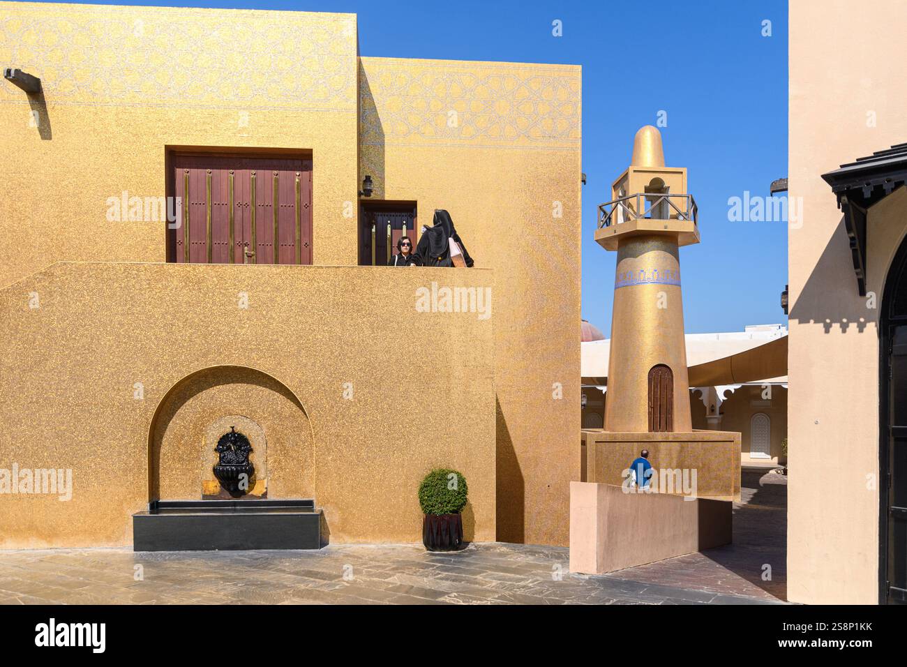 Doha, Qatar - January 4, 2025: The golden facade of the mosque in ...