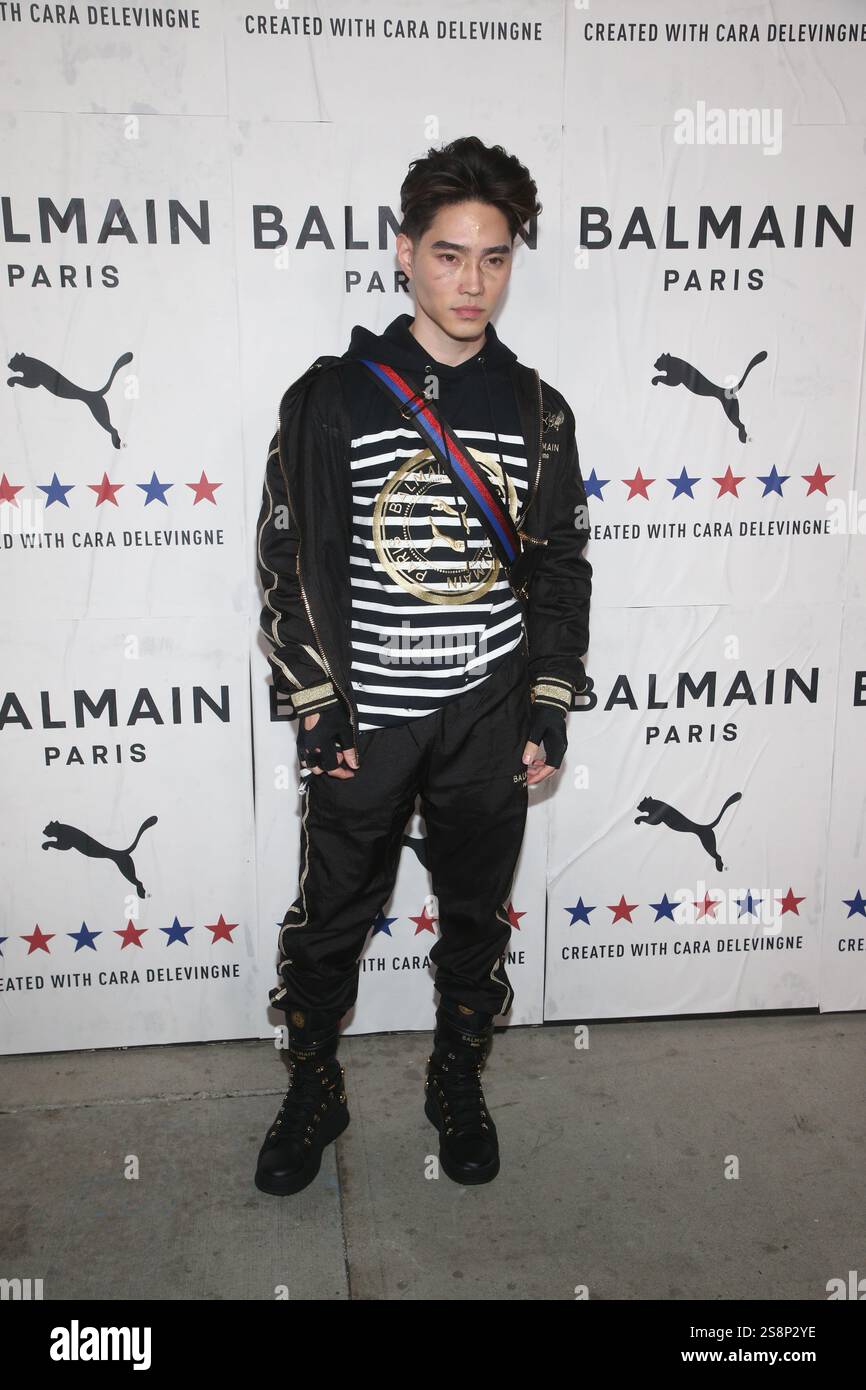 Guest at the PUMA x Balmain Launch Event, created by Cara Delevingne ...