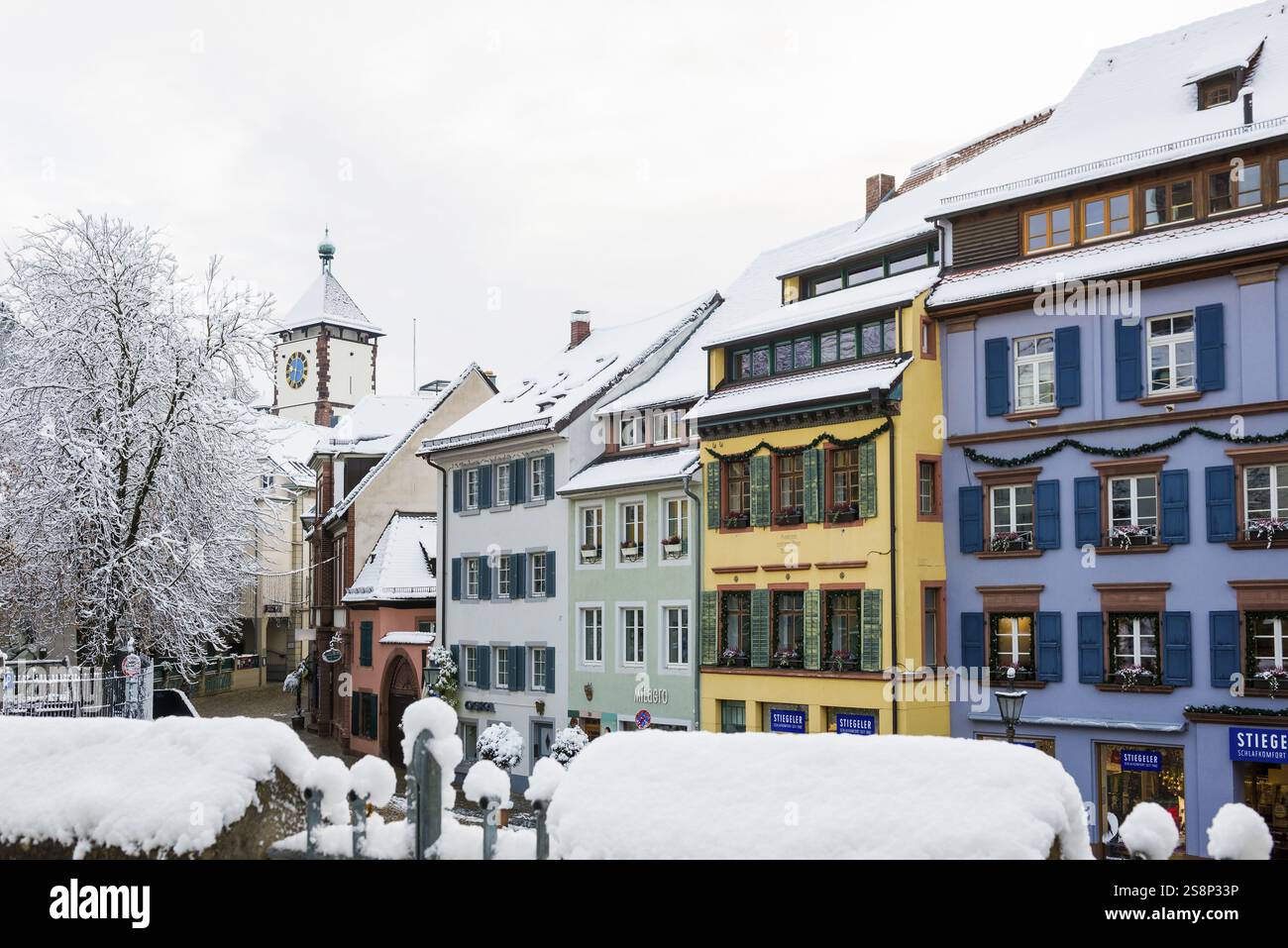 Houses covered with snow in the historic city centre, Freiburg im ...