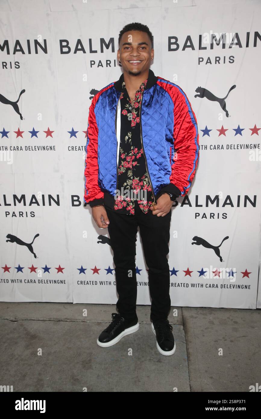 Guest at the PUMA x Balmain Launch Event, created by Cara Delevingne ...