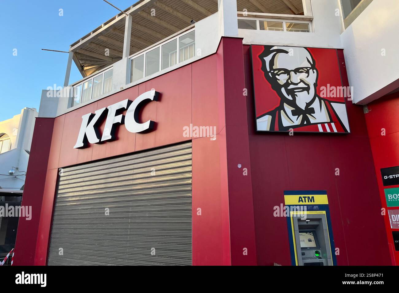 KFC Storefront with the shutters closed. Playa de las Américas, Arona ...