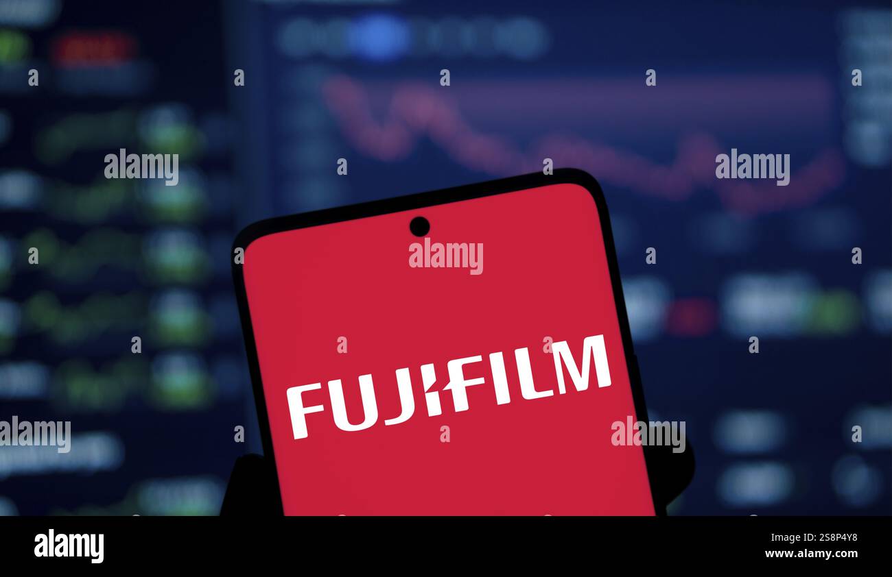 Fujifilm logo is displayed on smartphone. Fujifilm Holdings Corporation ...