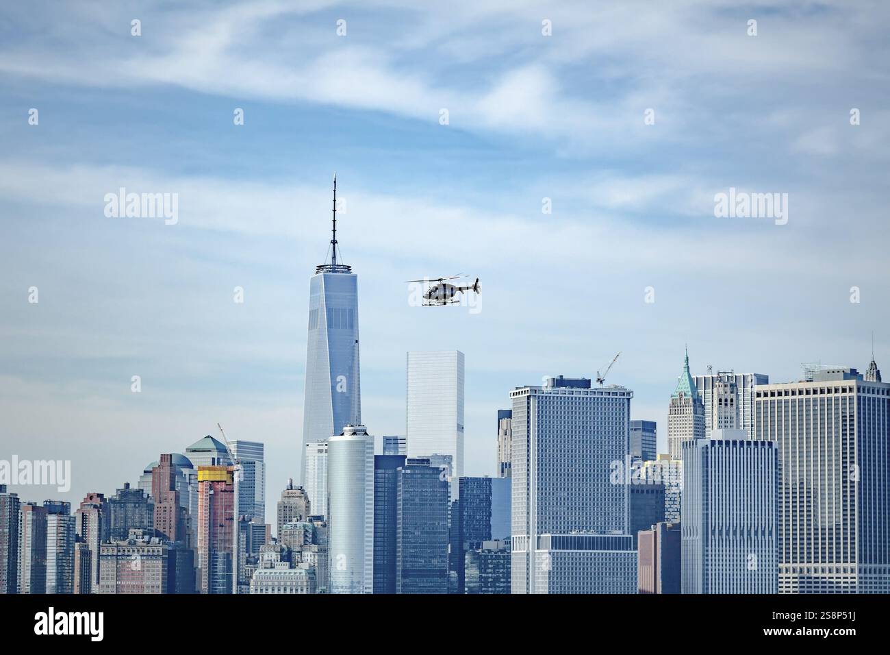 An image of a helicopter over new york Stock Photo - Alamy