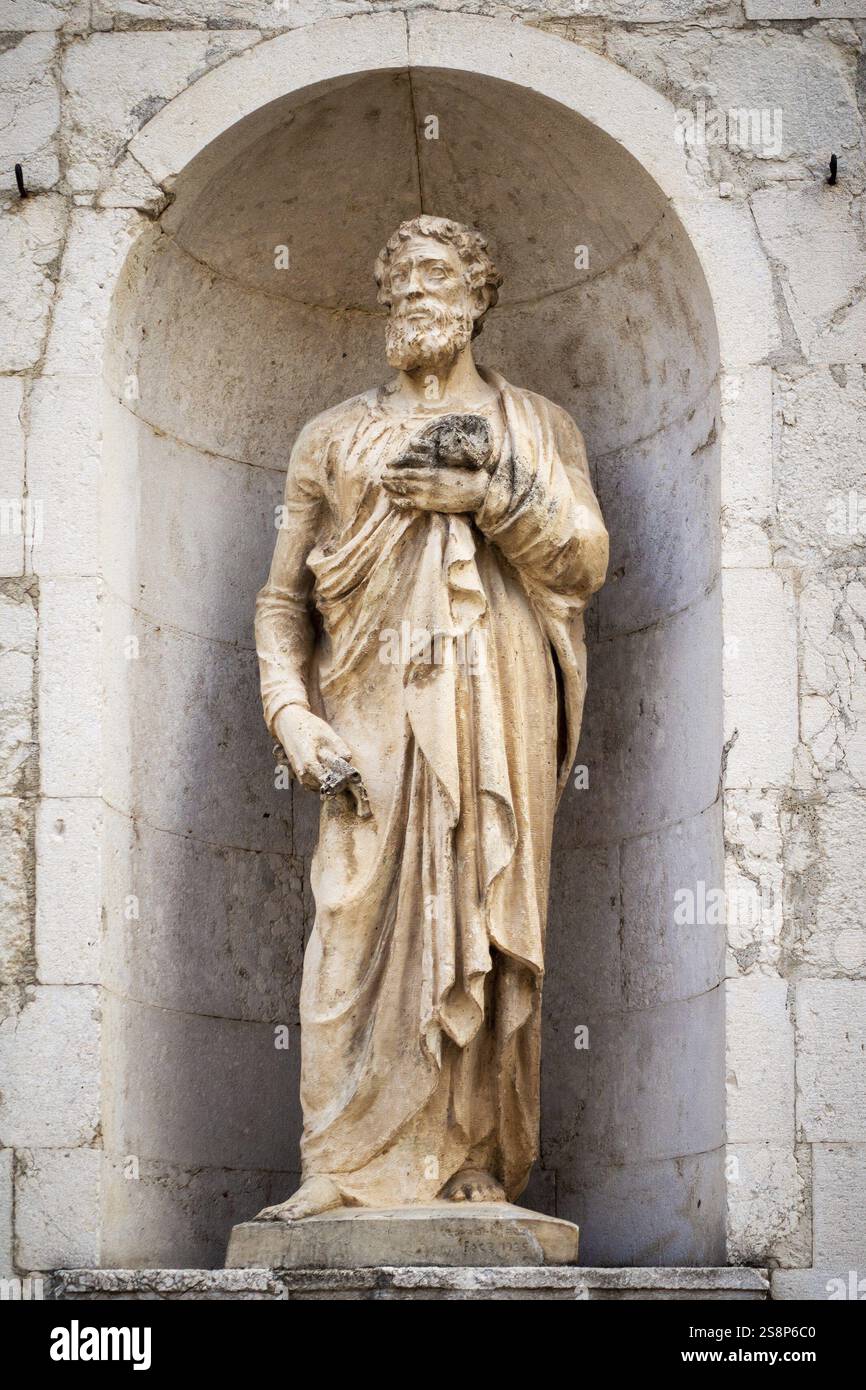 An image of an ancient stone Saint Peter statue at Assisi Marche Italy ...