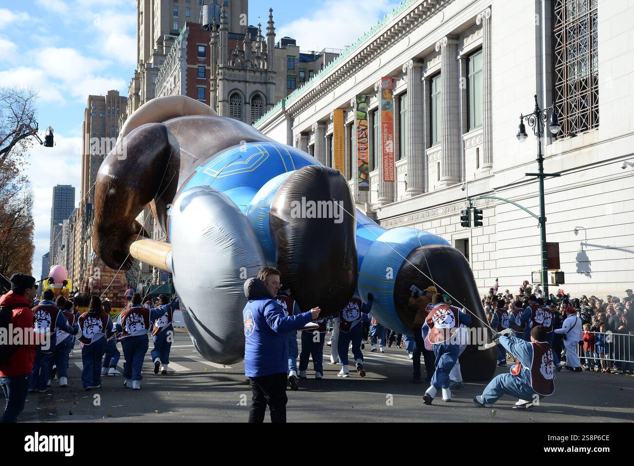 Handlers struggle with the Smokey Bear balloon at the 93rd Annual Macy ...